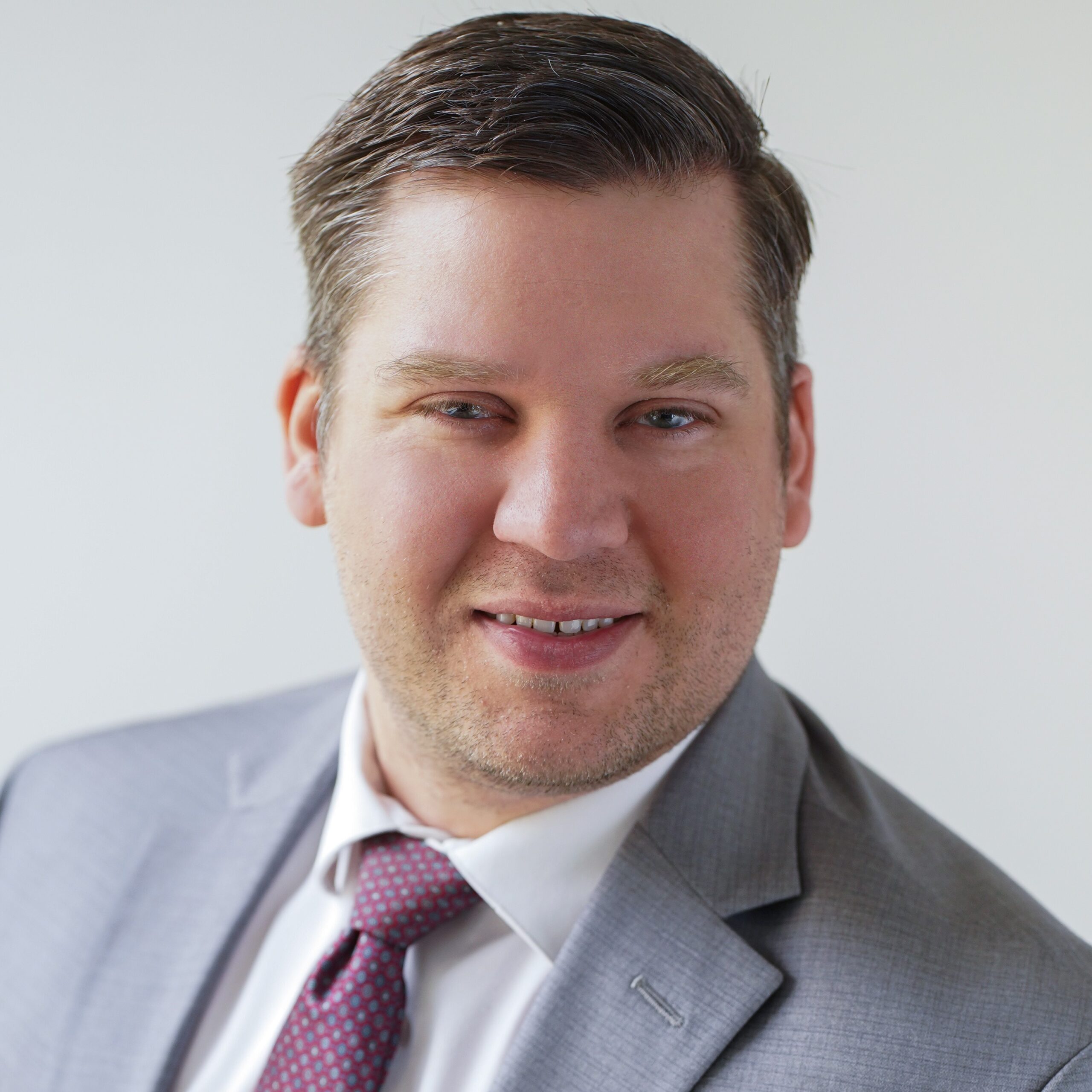 AJ Headshot square | Smith Freed Eberhard